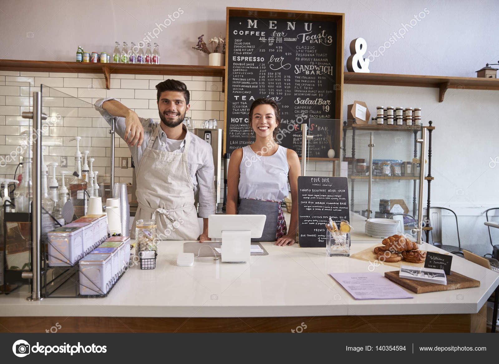 Couple ready to serving customers — Stock Photo © monkeybusiness #140354594