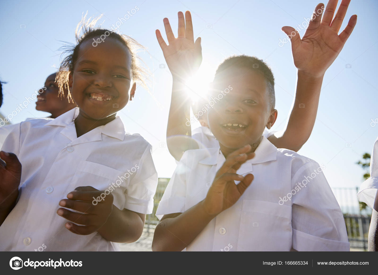 School kids waving to camera — Stock Photo © monkeybusiness #166665334