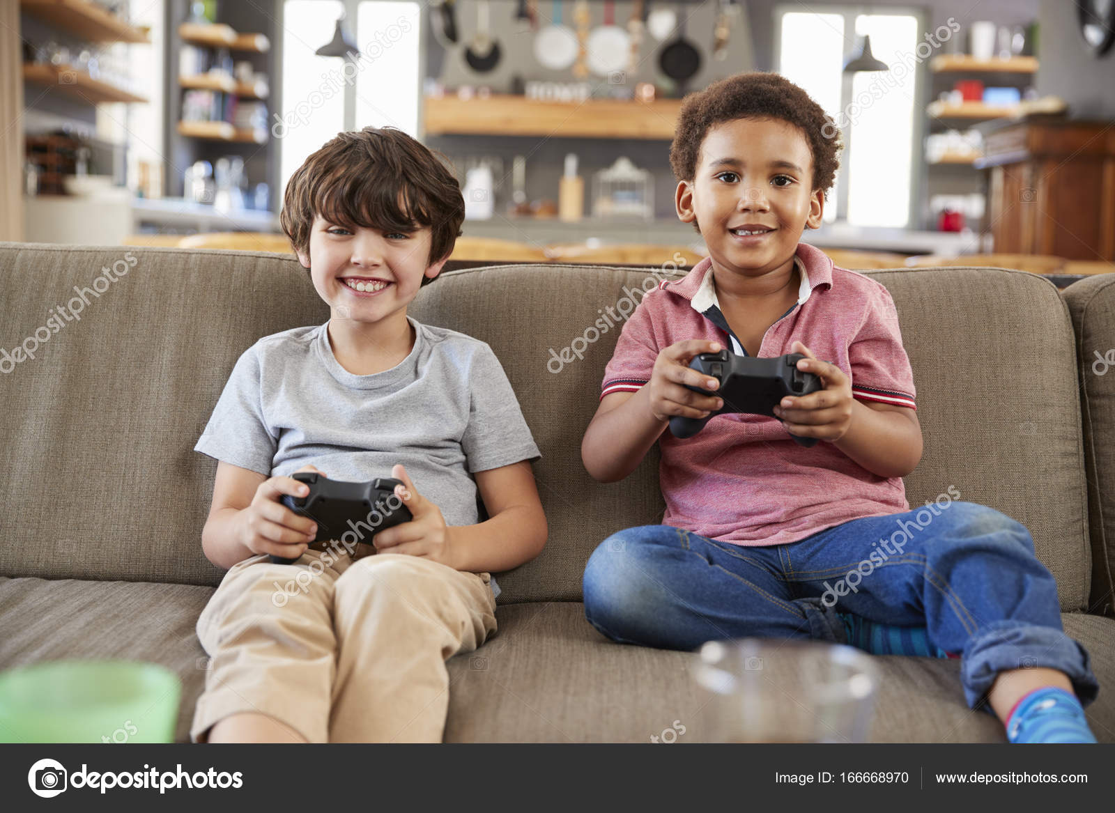 Two Boys Playing Video Game Together — Stock Photo © monkeybusiness ...