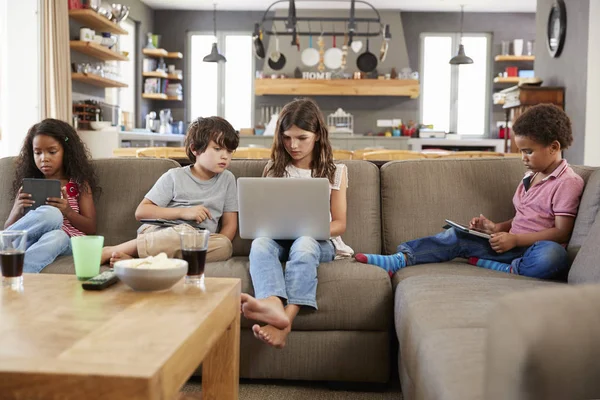 Children using electronic gadgets Stock Photo by ©monkeybusiness 140351436