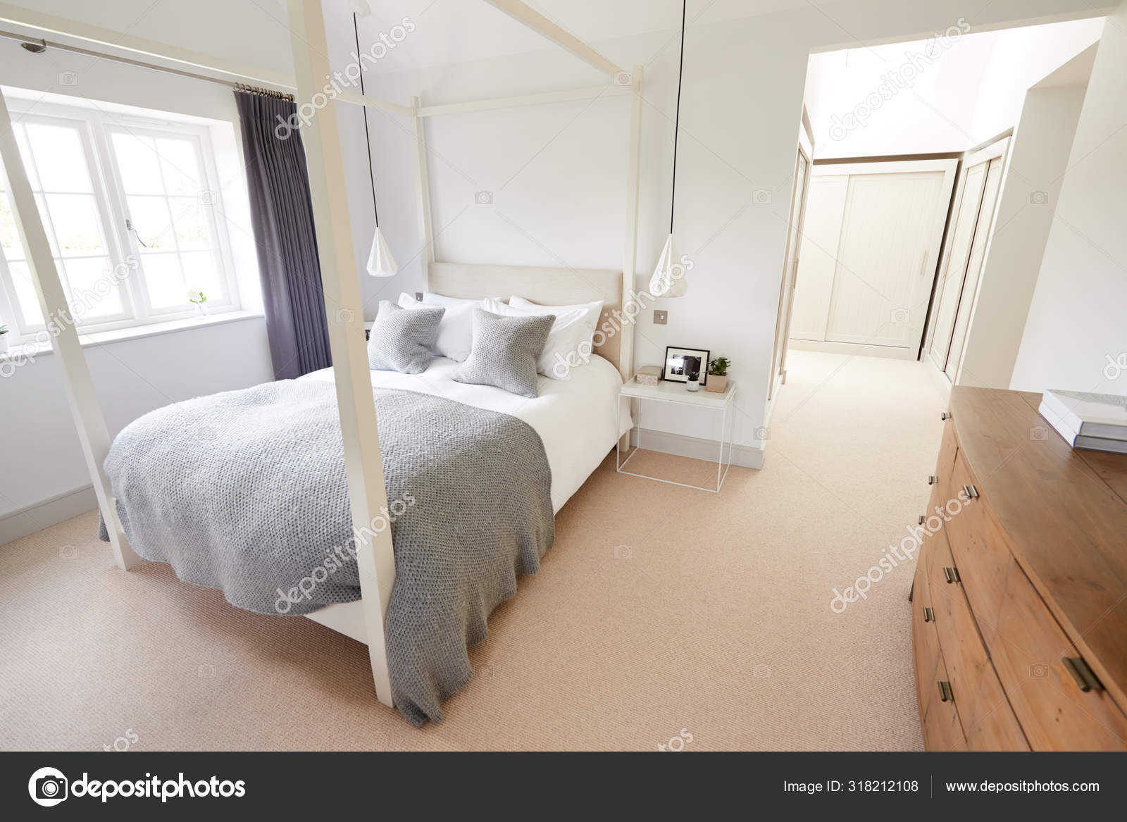 Empty Master Bedroom With Bed