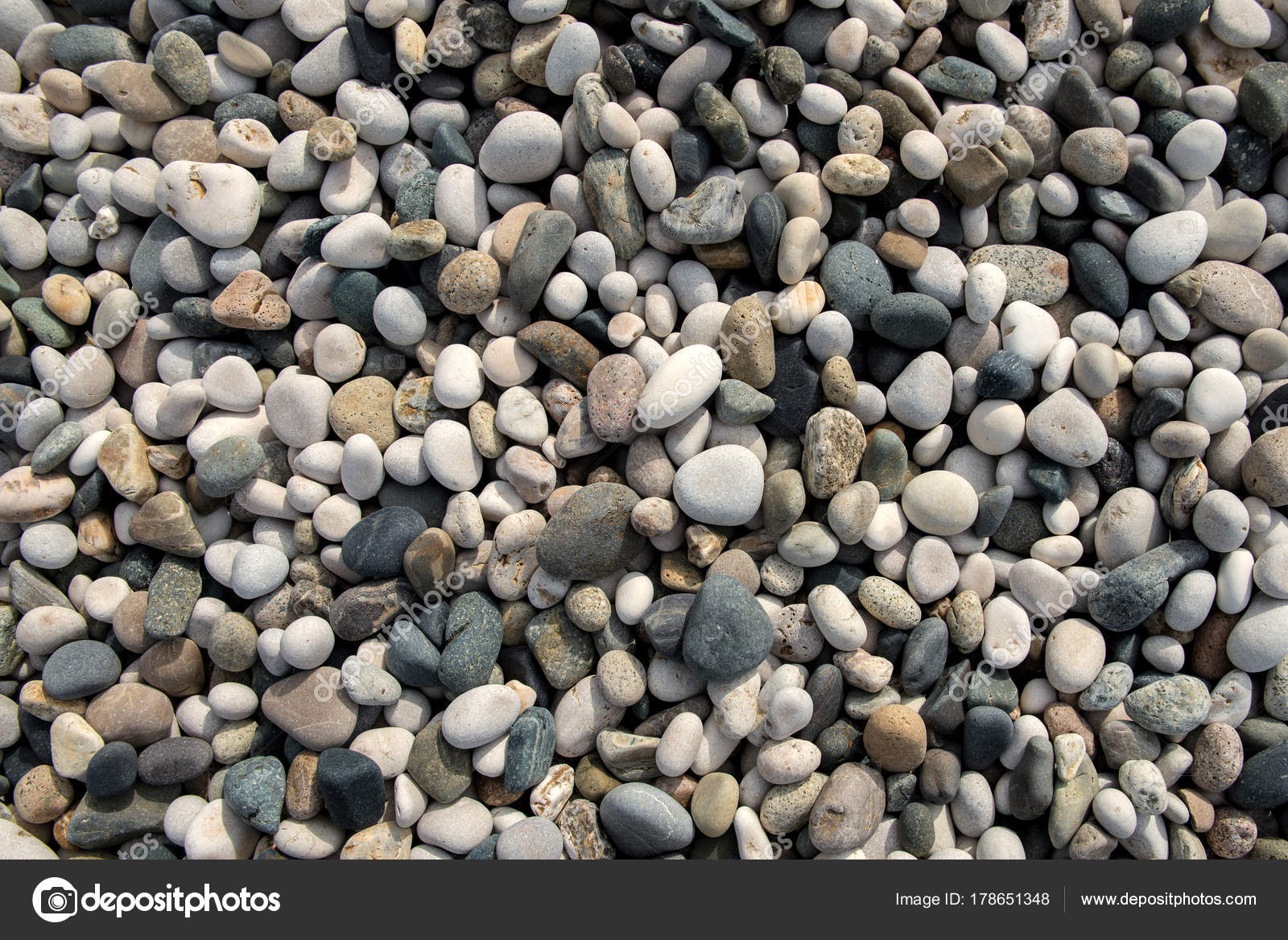 Beach stones background. Top view. Stock Photo by ©thirteen 178651348