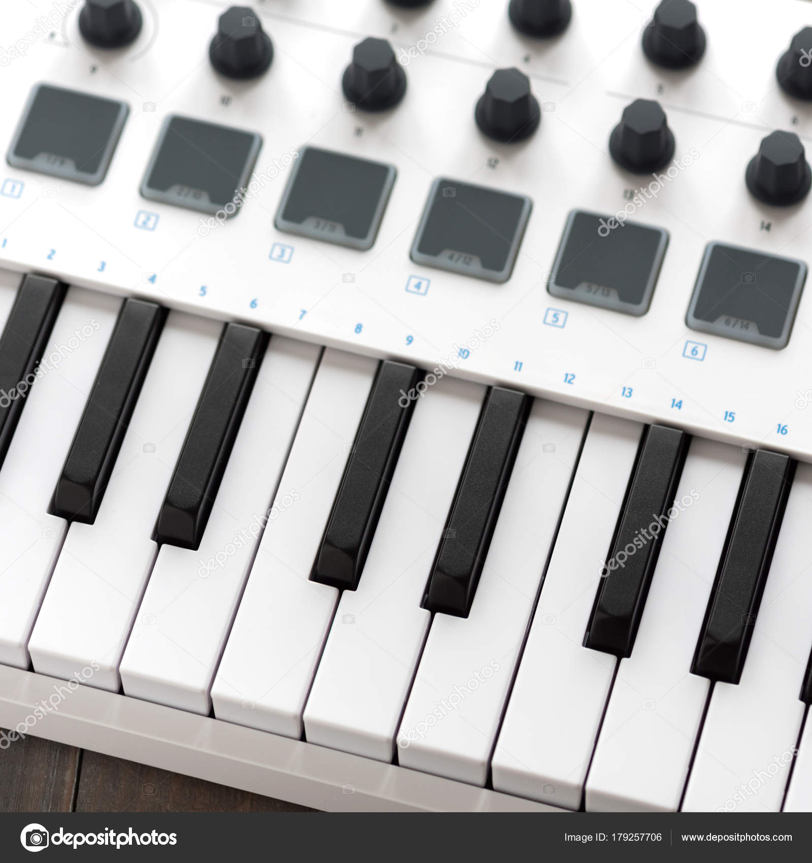 MIDI keyboard with pads and faders. — Stock Photo © thirteen #179257706 MIDI keyboard with pads and faders. — Stock Photo © thirteen #179257706