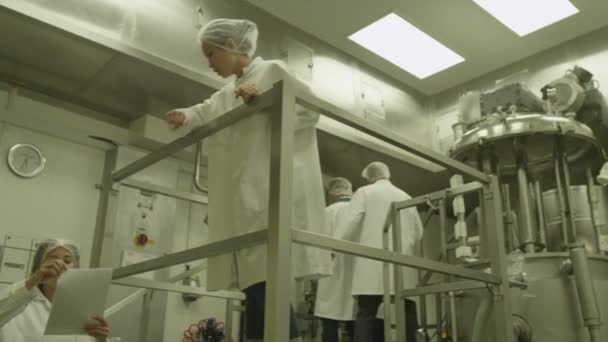 Scientists in pharmaceutical research factory — Stock Video ...