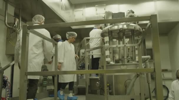 Scientists in pharmaceutical research factory — Stock Video ...