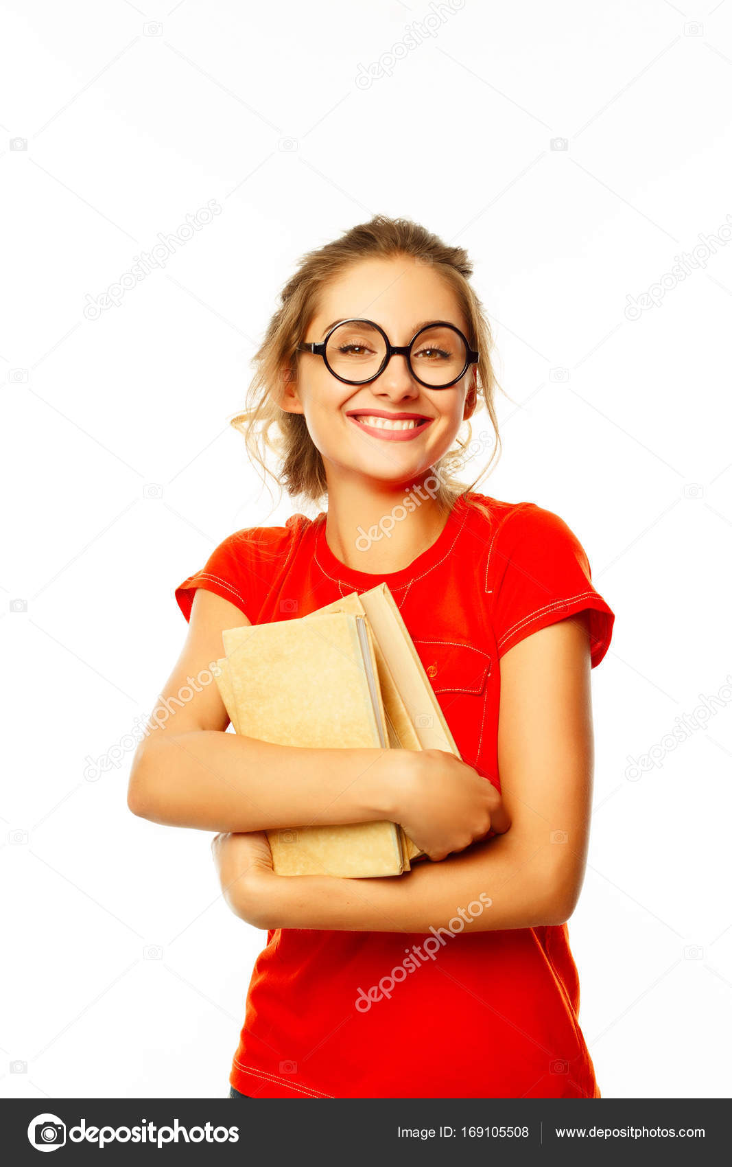 Portrait of a pretty girl wearing glasses pretty student holding Stock ...