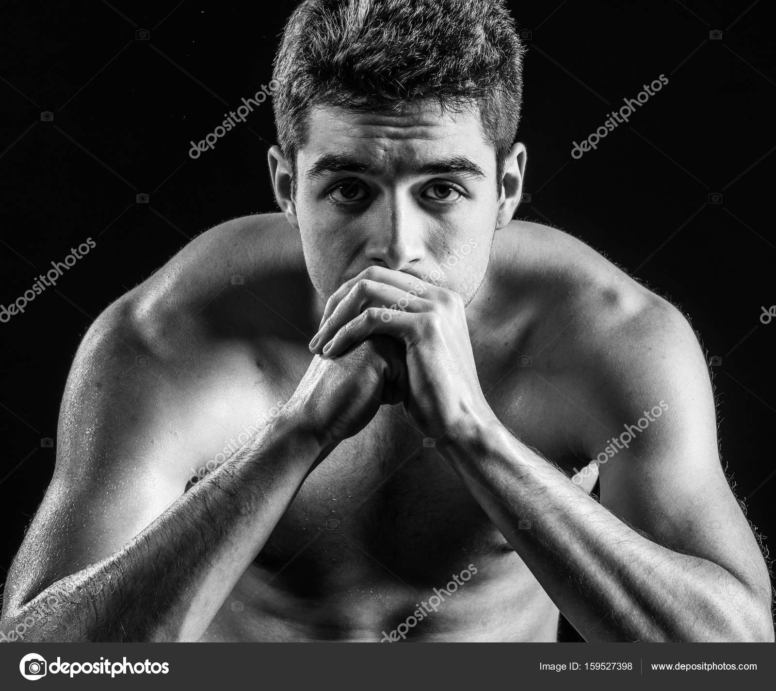 Shirtless muscular man staring into camera seriously Stock Photo by ...