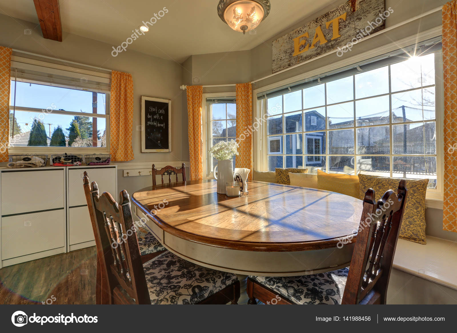 Sun filled breakfast nook with window seat Stock Photo by ©iriana88w ...