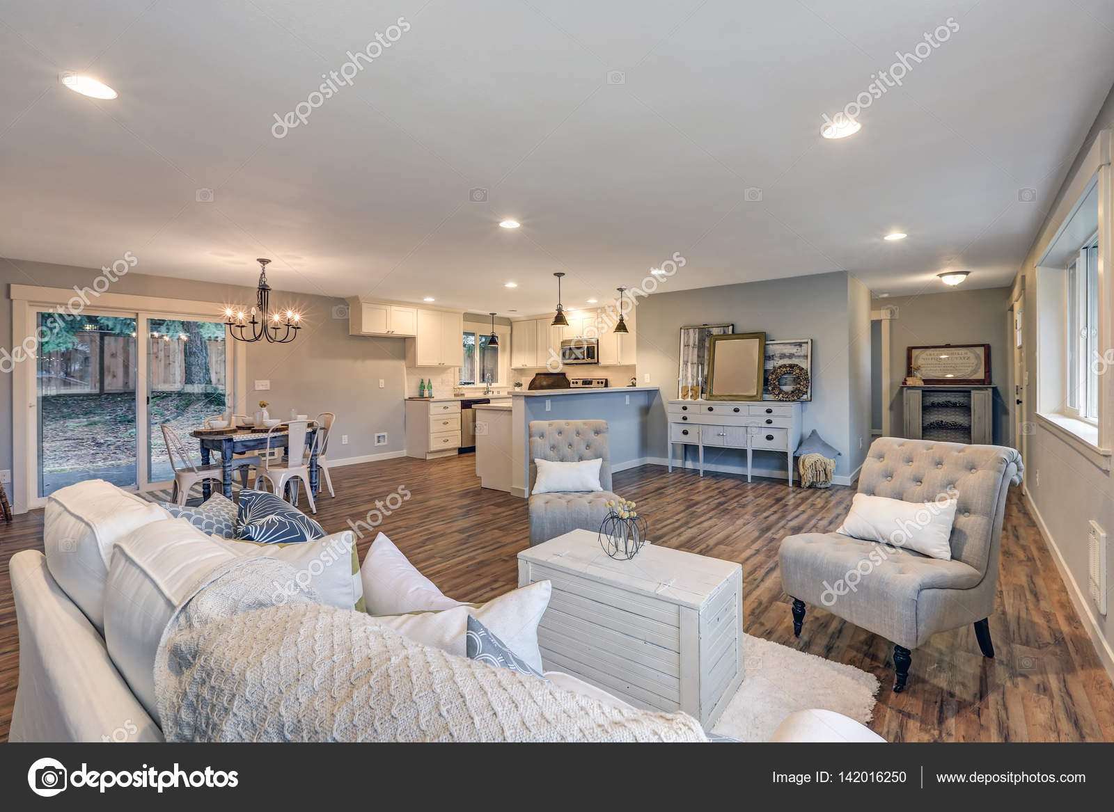 Airy light filled living room in soft blue and grey colors Stock Photo ...