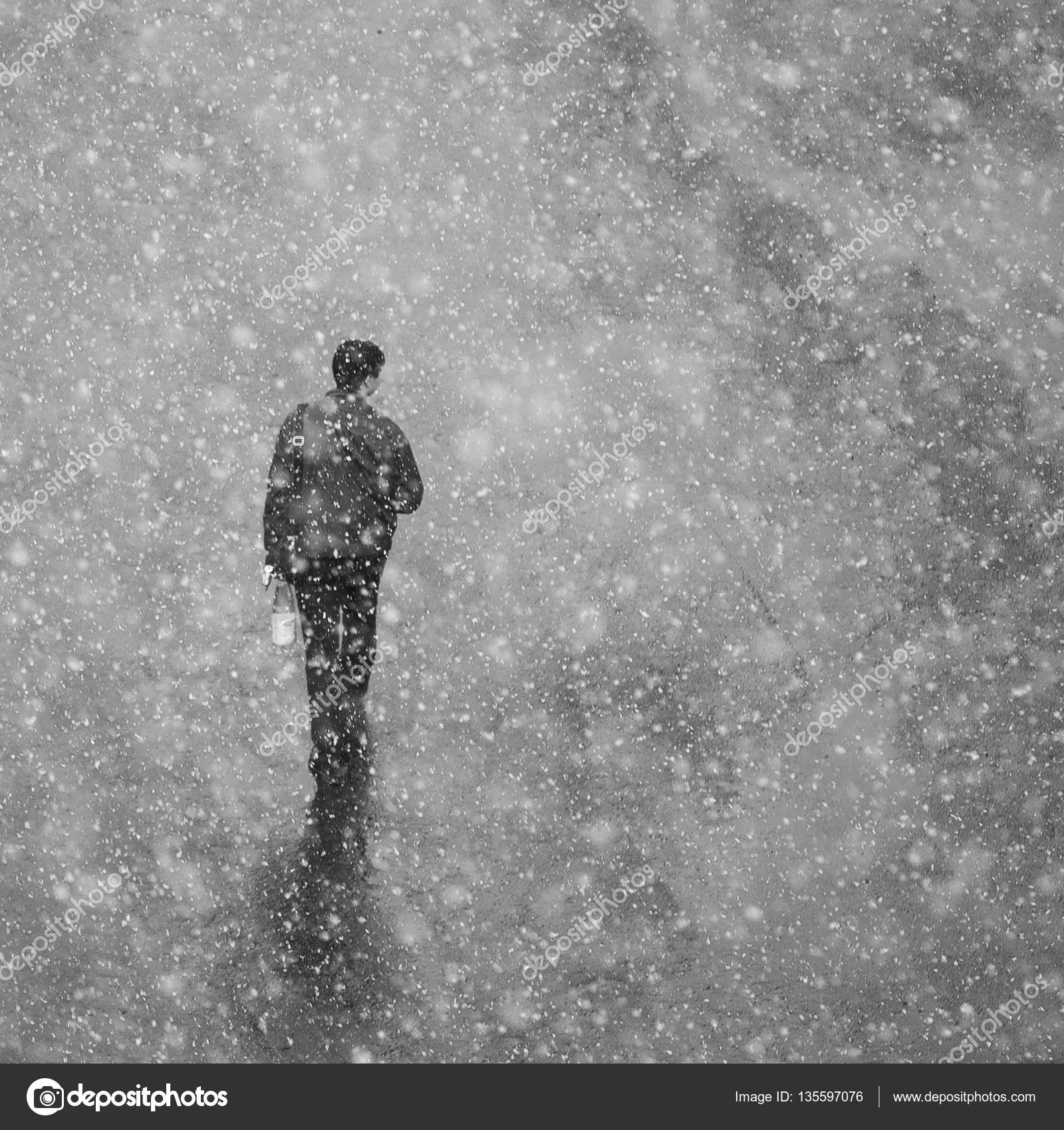 Lonely Man Walking In Rain