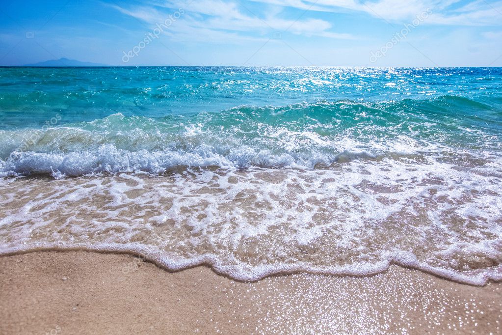 Wave of sea on sandy beach — Stock Photo © yellow2j #127973718