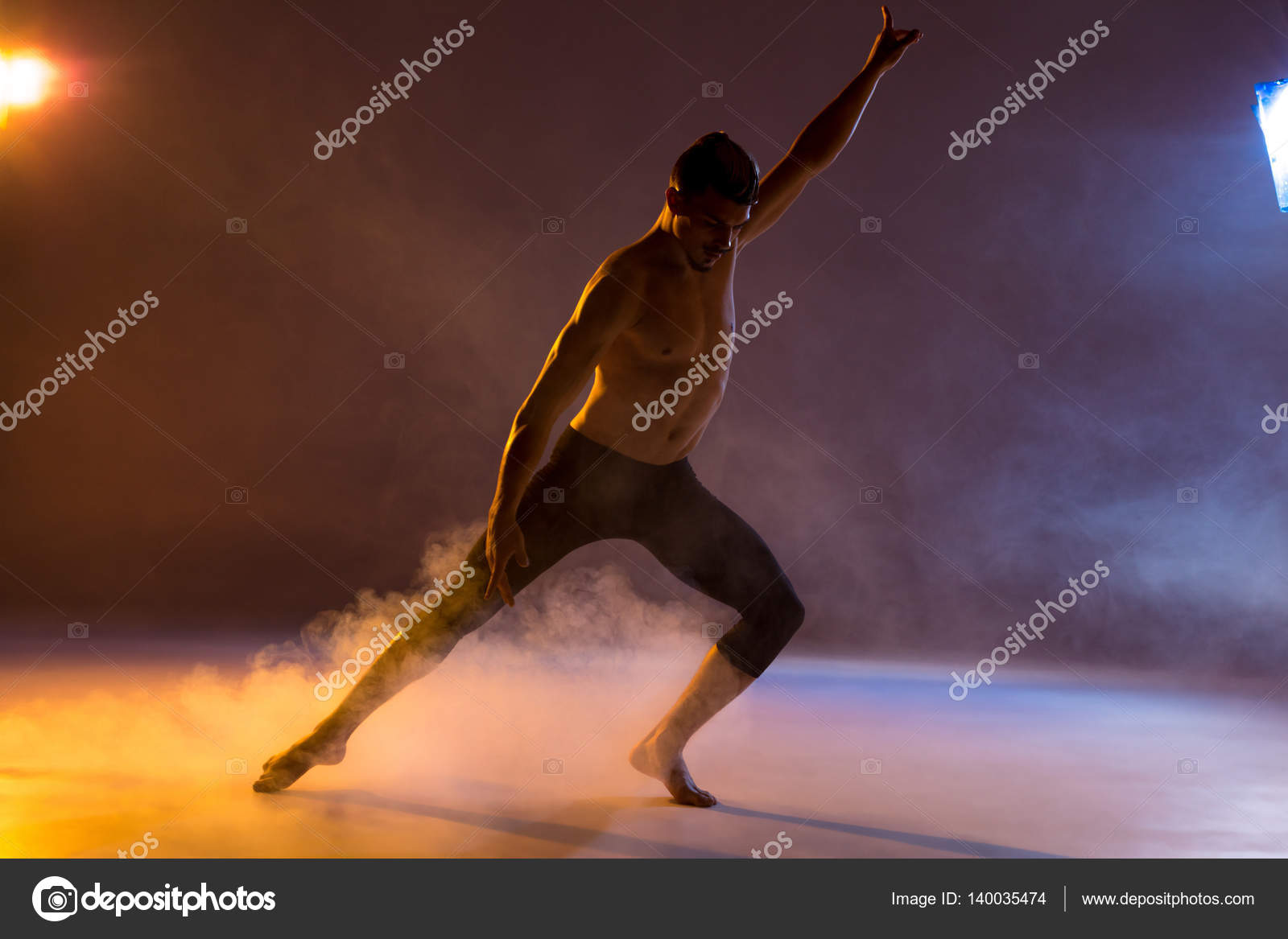 Young man dancing — Stock Photo © OlgaZakrevskaya #140035474