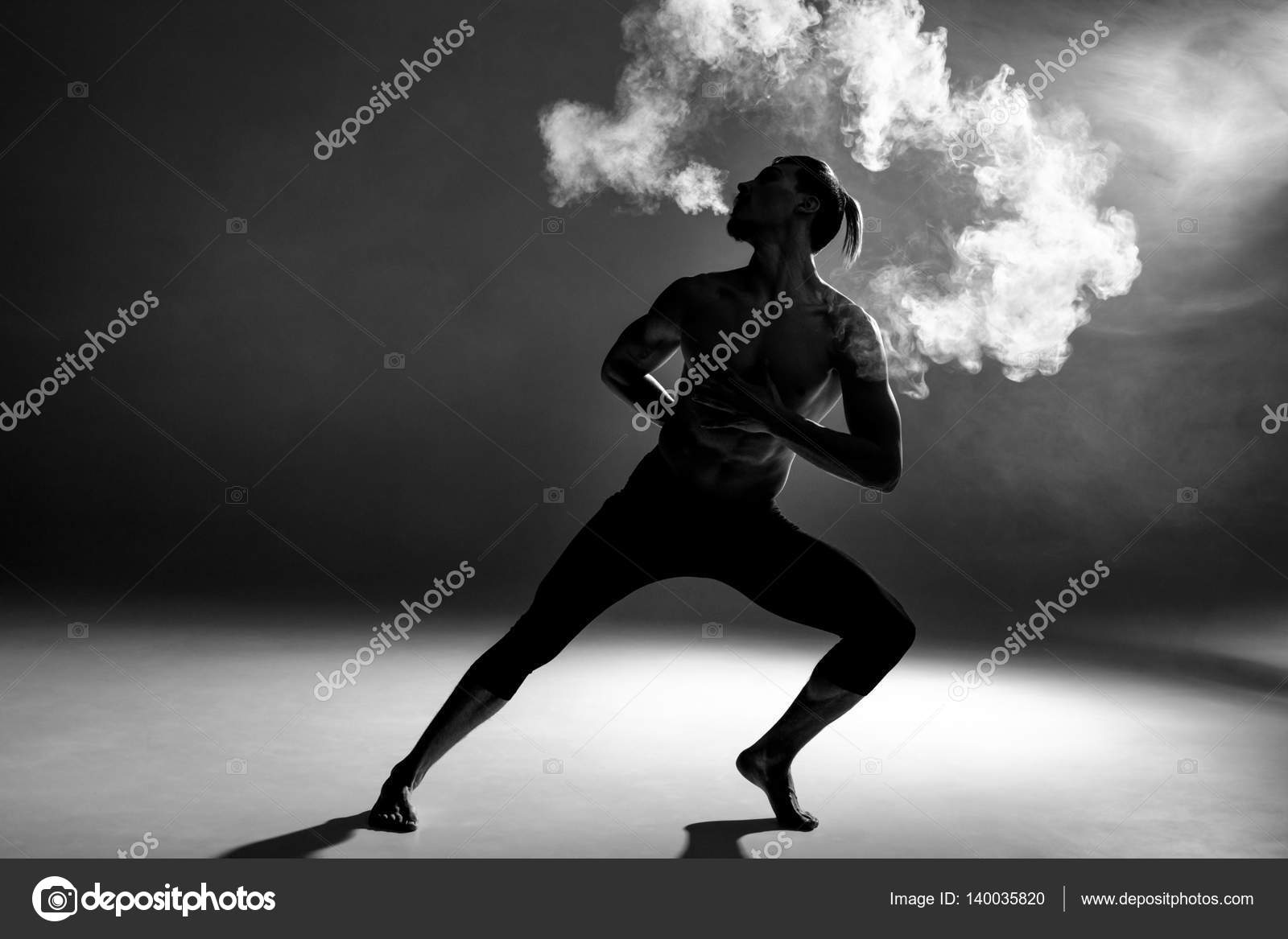 Young man vaping — Stock Photo © OlgaZakrevskaya #140035820