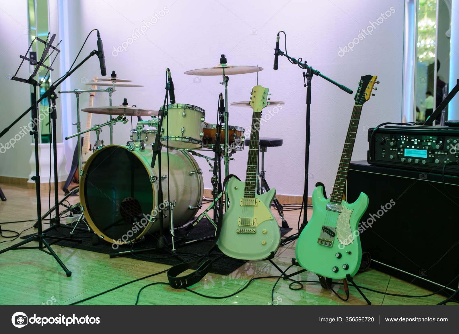 Empty Stage With Mic And Guitar