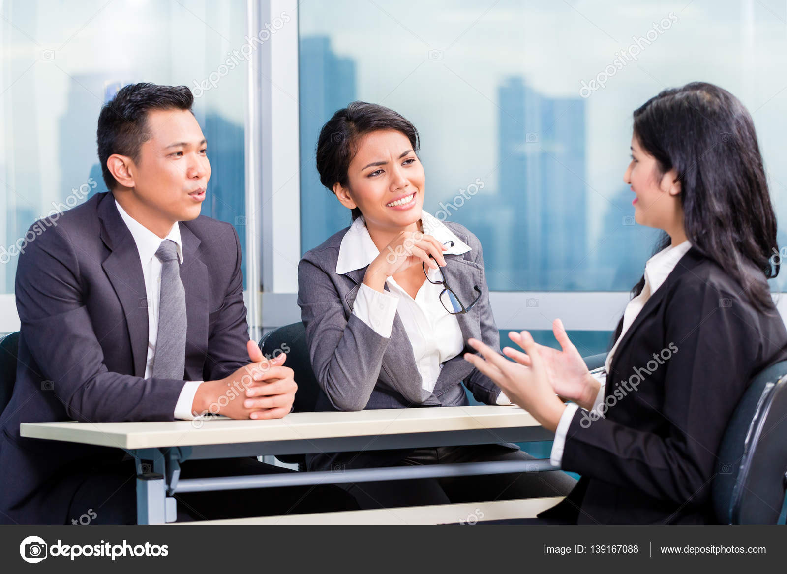 Asian recruitment team hiring candidate — Stock Photo © Kzenon #139167088 Asian recruitment team hiring candidate — Stock Photo © Kzenon #139167088