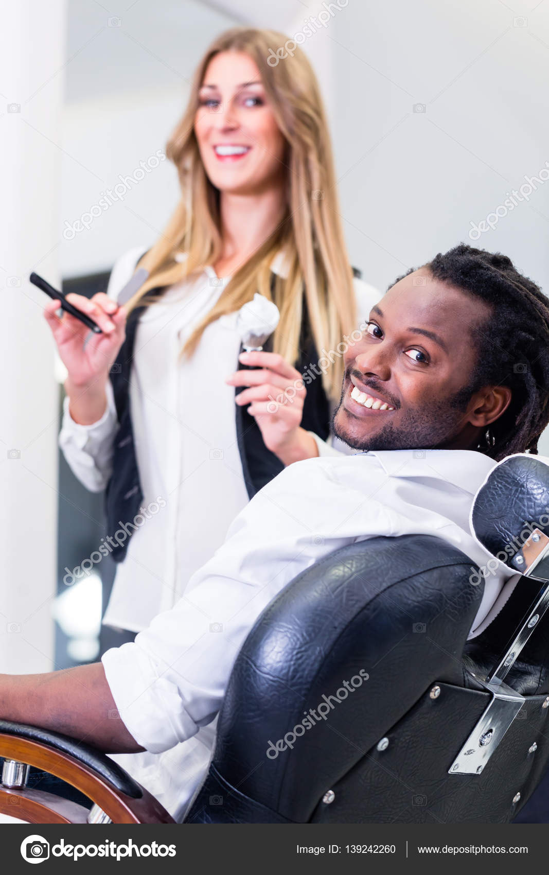 Happy barber and smiling customer — Stock Photo © Kzenon #139242260 Happy barber and smiling customer — Stock Photo © Kzenon #139242260