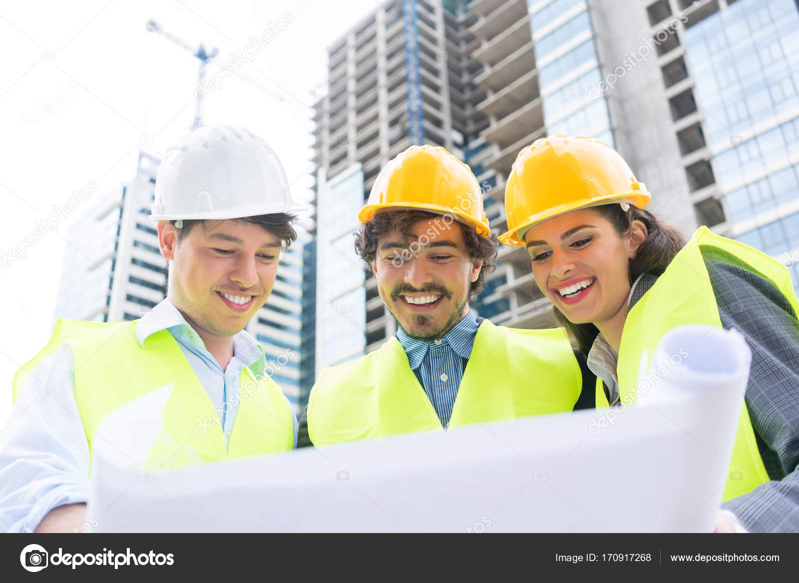 Civil engineers with blueprints — Stock Photo © Kzenon #170917268