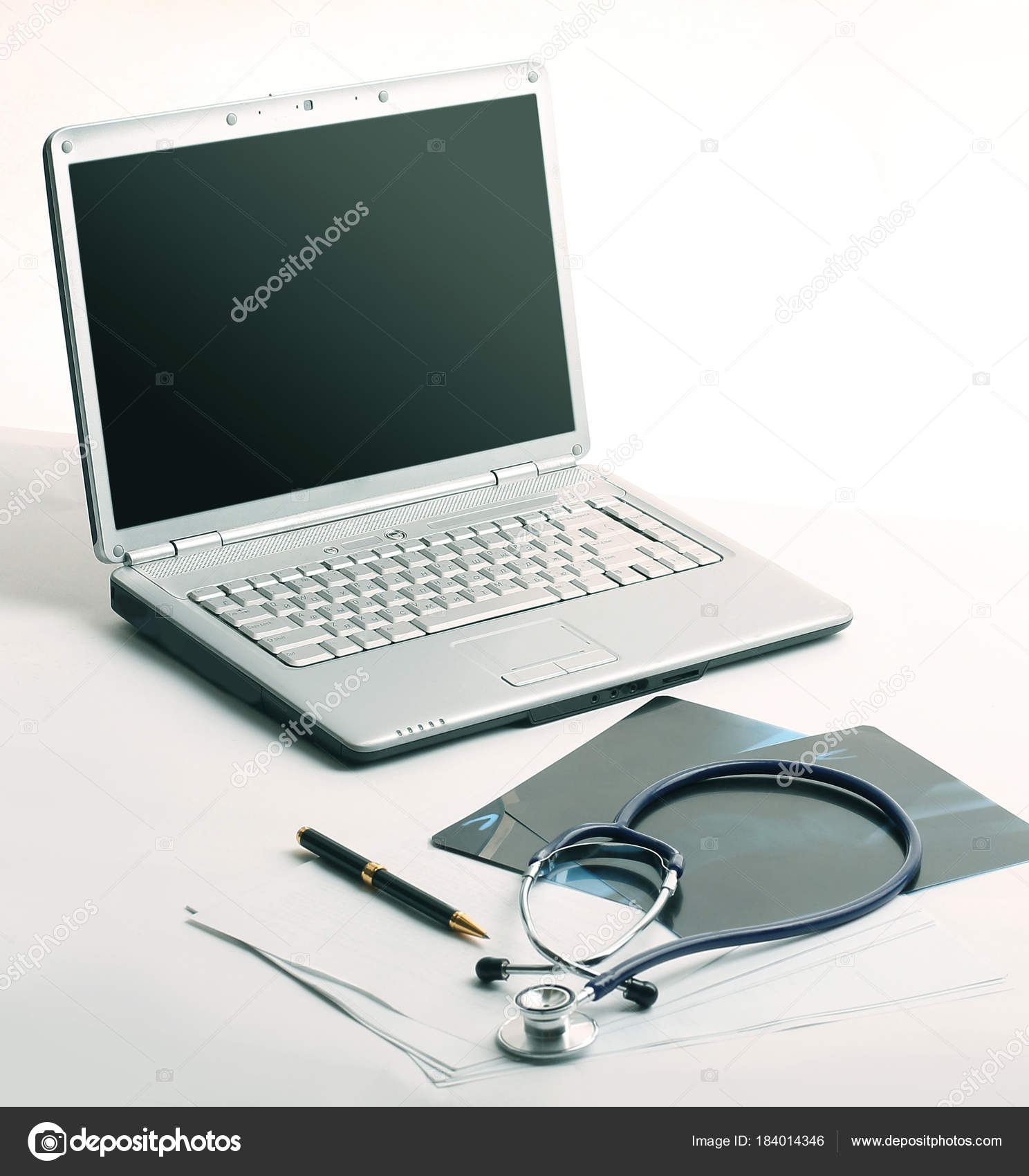 Laptop ,stethoscope and x-ray on the table — Stock Photo ...