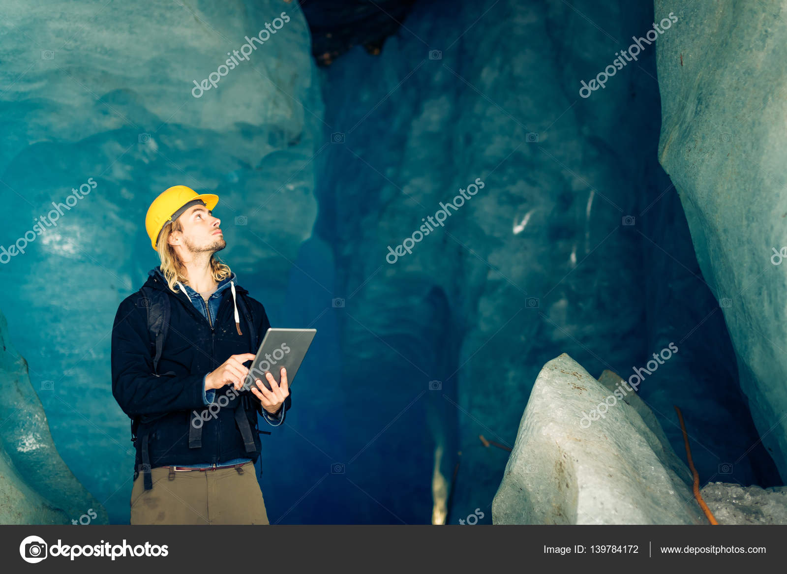 Scientist At An Expedition Site Examining A Glacier Stock Photo by ...