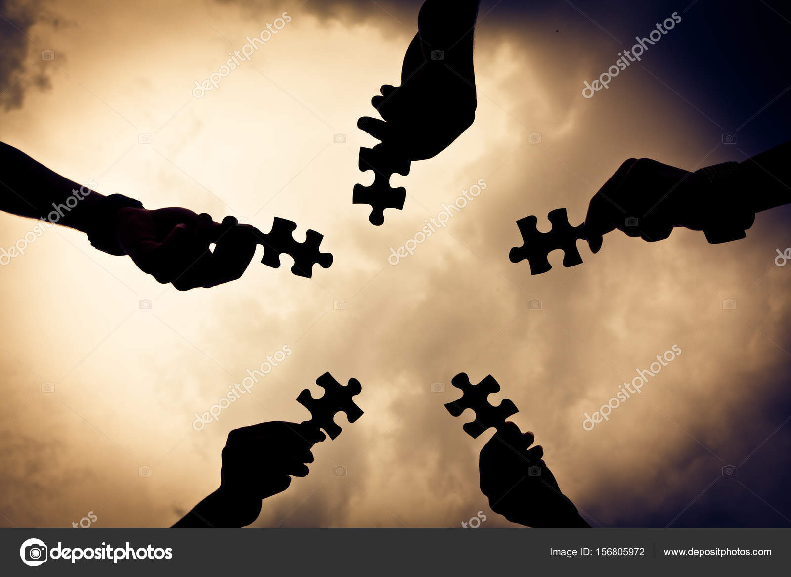 Hands With Puzzle Pieces Stock Photo by ©nullplus 156805972