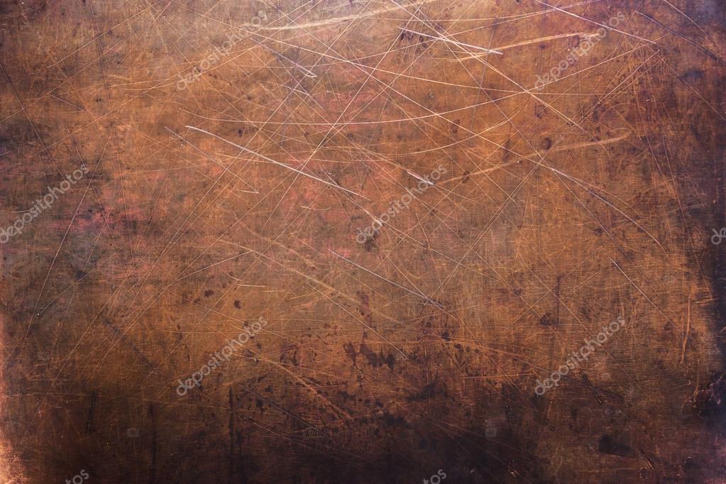 Textura brillante de cobre o latón como fondo para el diseño 2022