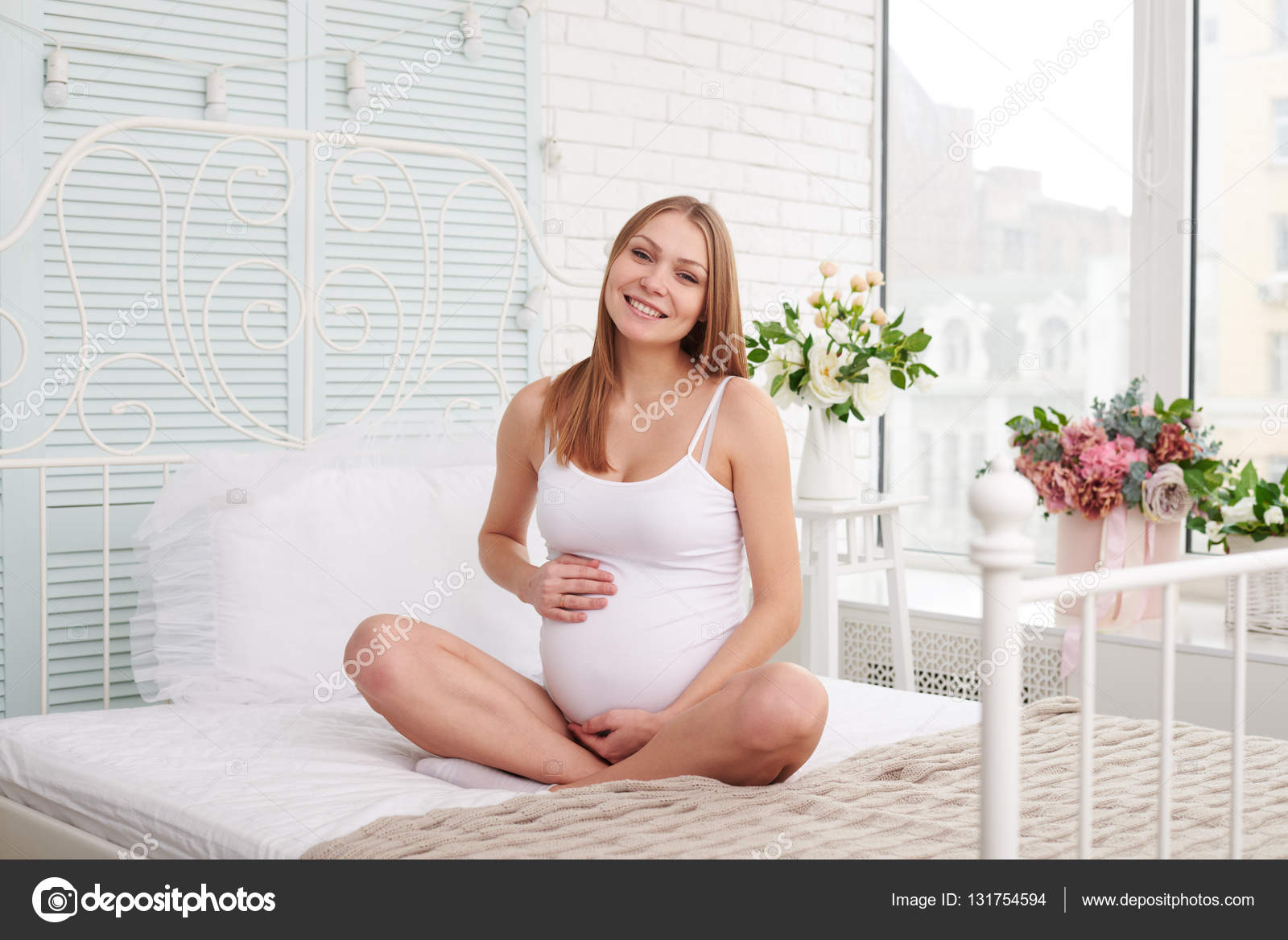 Future mom feels perfect early in the morning while posing at th Stock ... Future mom feels perfect early in the morning while posing at th Stock ...