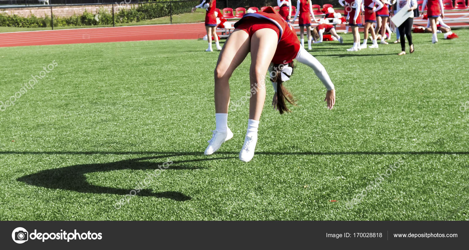 Cheerleader Doing A Front Flip