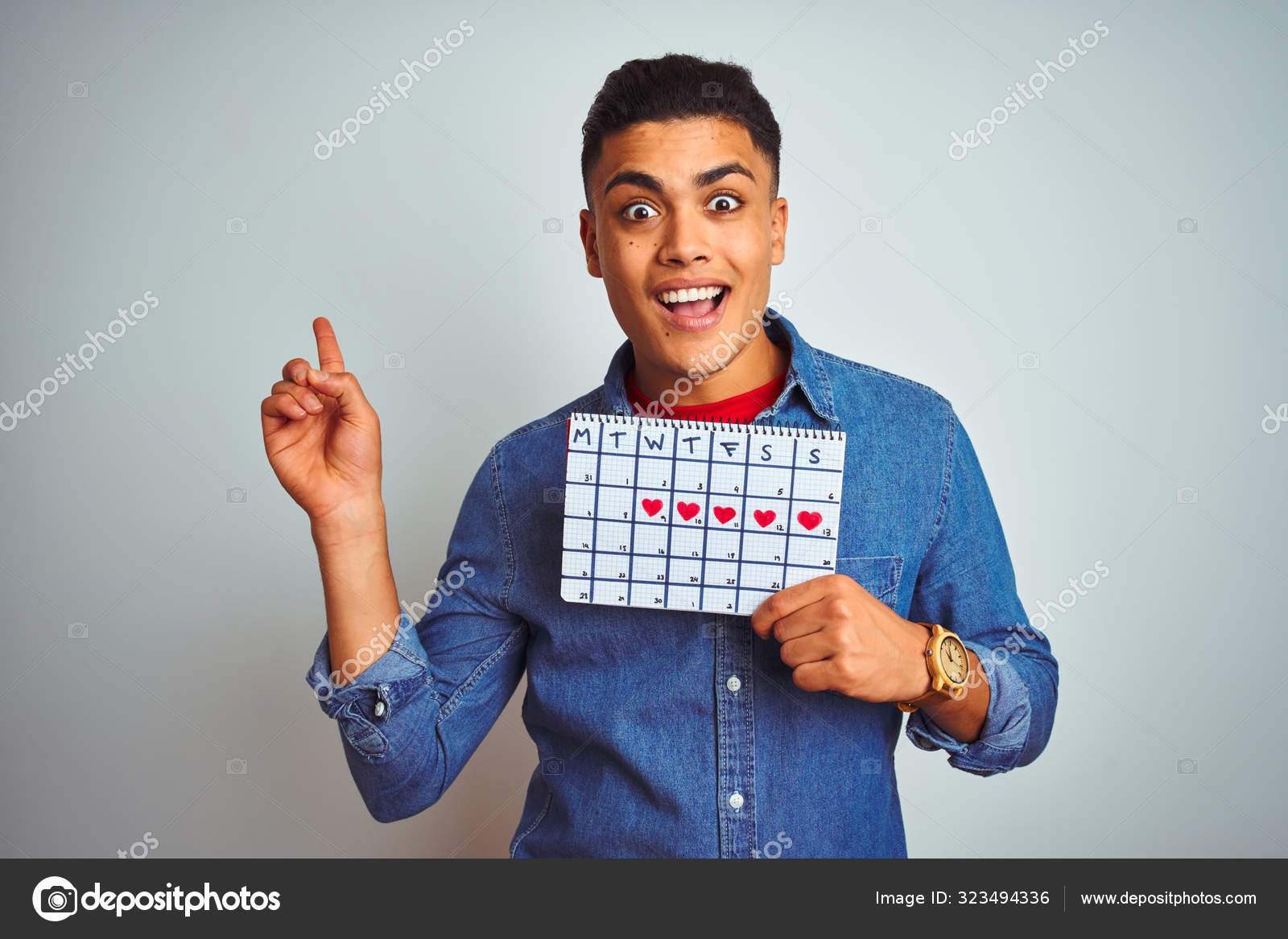 Young Brazilian Man Holding Calendar Standing Isolated White Background ...