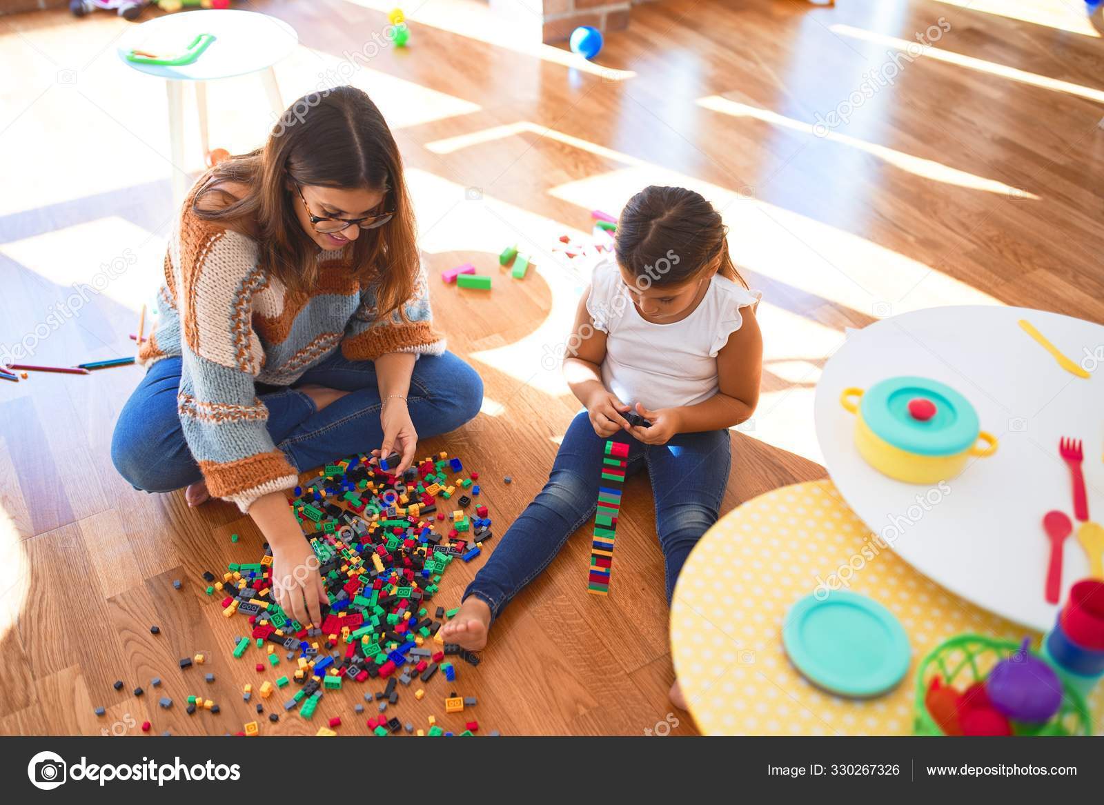 Beautiful Teacher Toddler Playing Building Blocks Toy Lots Toys ...