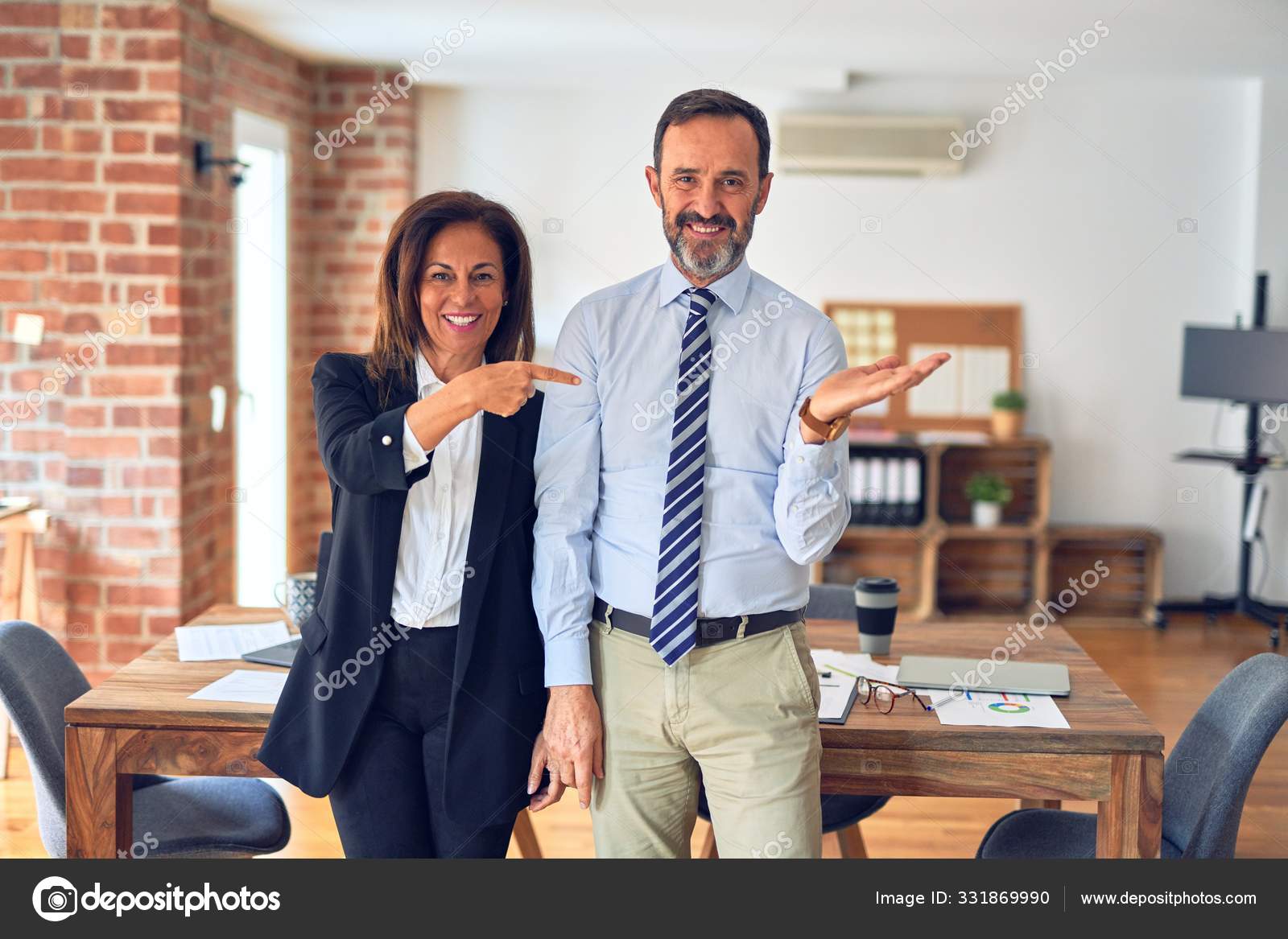 Two Middle Age Business Workers Standing Working Together Meeting ...