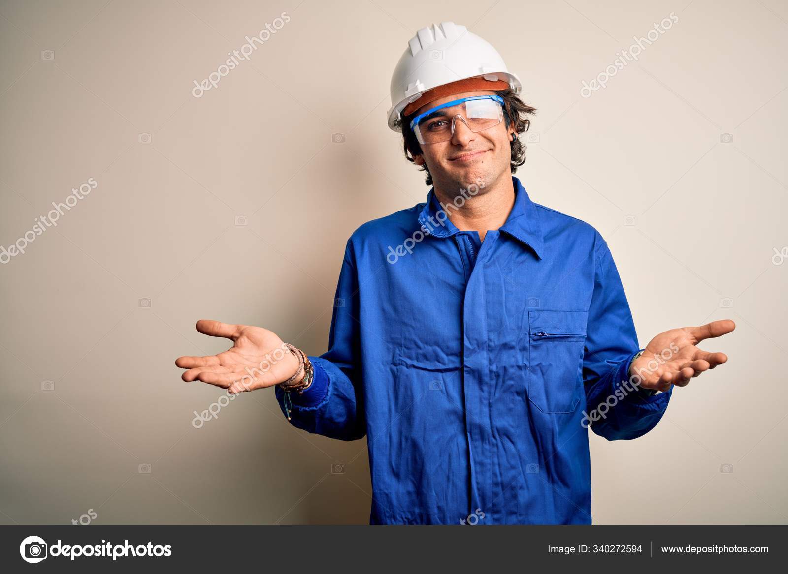 Young Constructor Man Wearing Uniform Security Helmet Isolated White ...