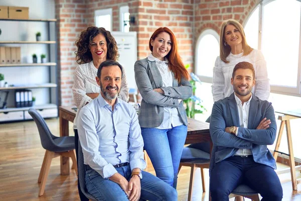 Group of business workers smiling happy and confident. Posing together ...