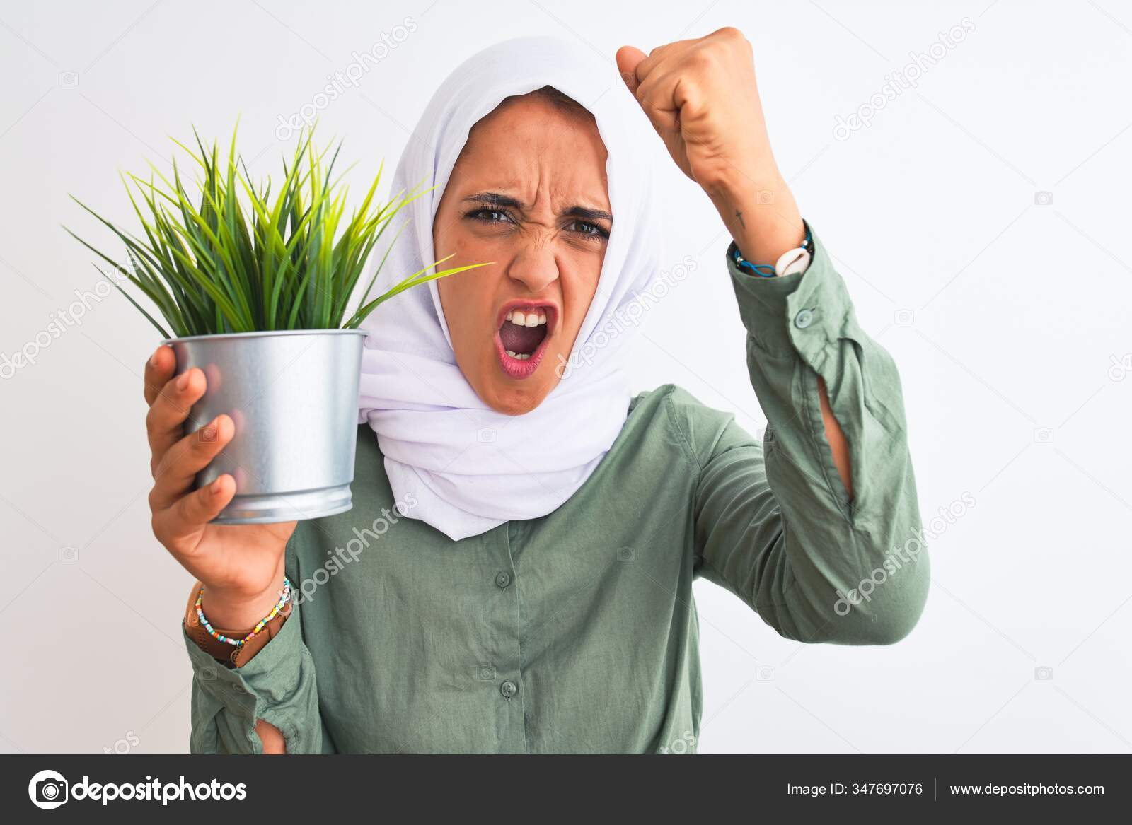 Young Arab Woman Wearing Hijab Holding Plant Pot Isolated Background ...