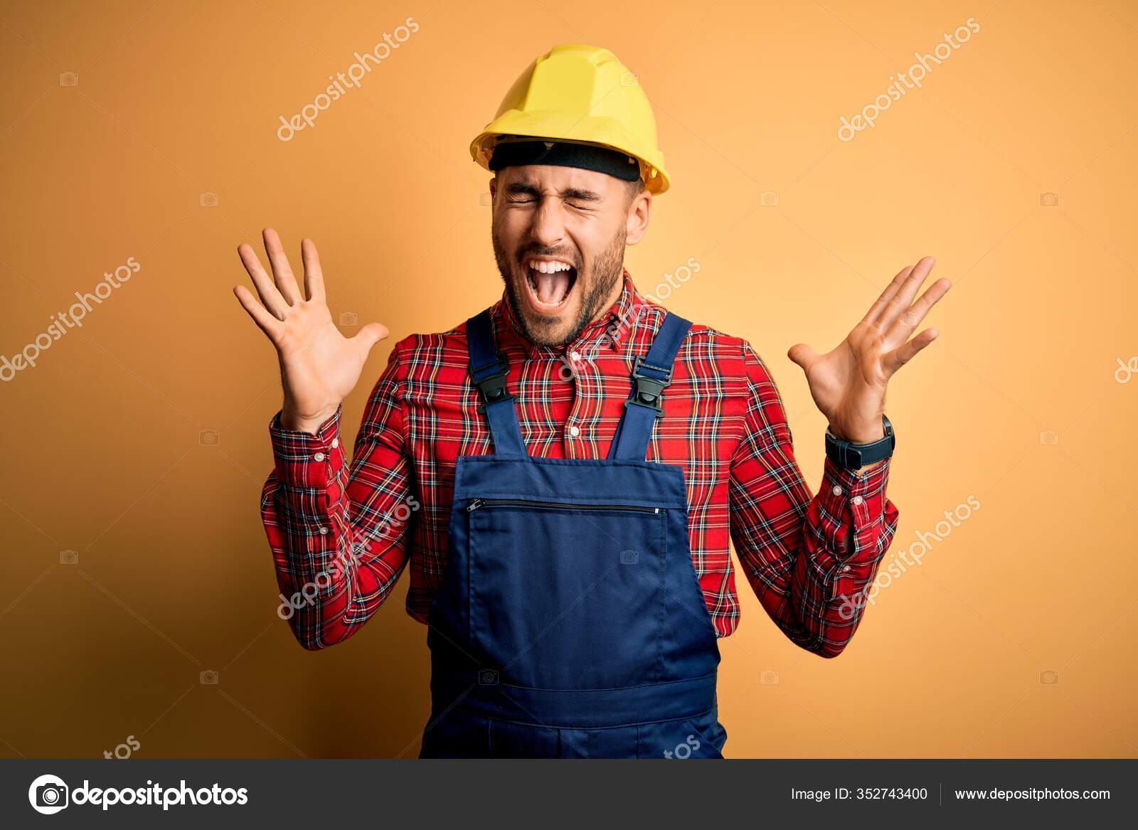 Young Builder Man Wearing Construction Uniform Safety Helmet Yellow ...
