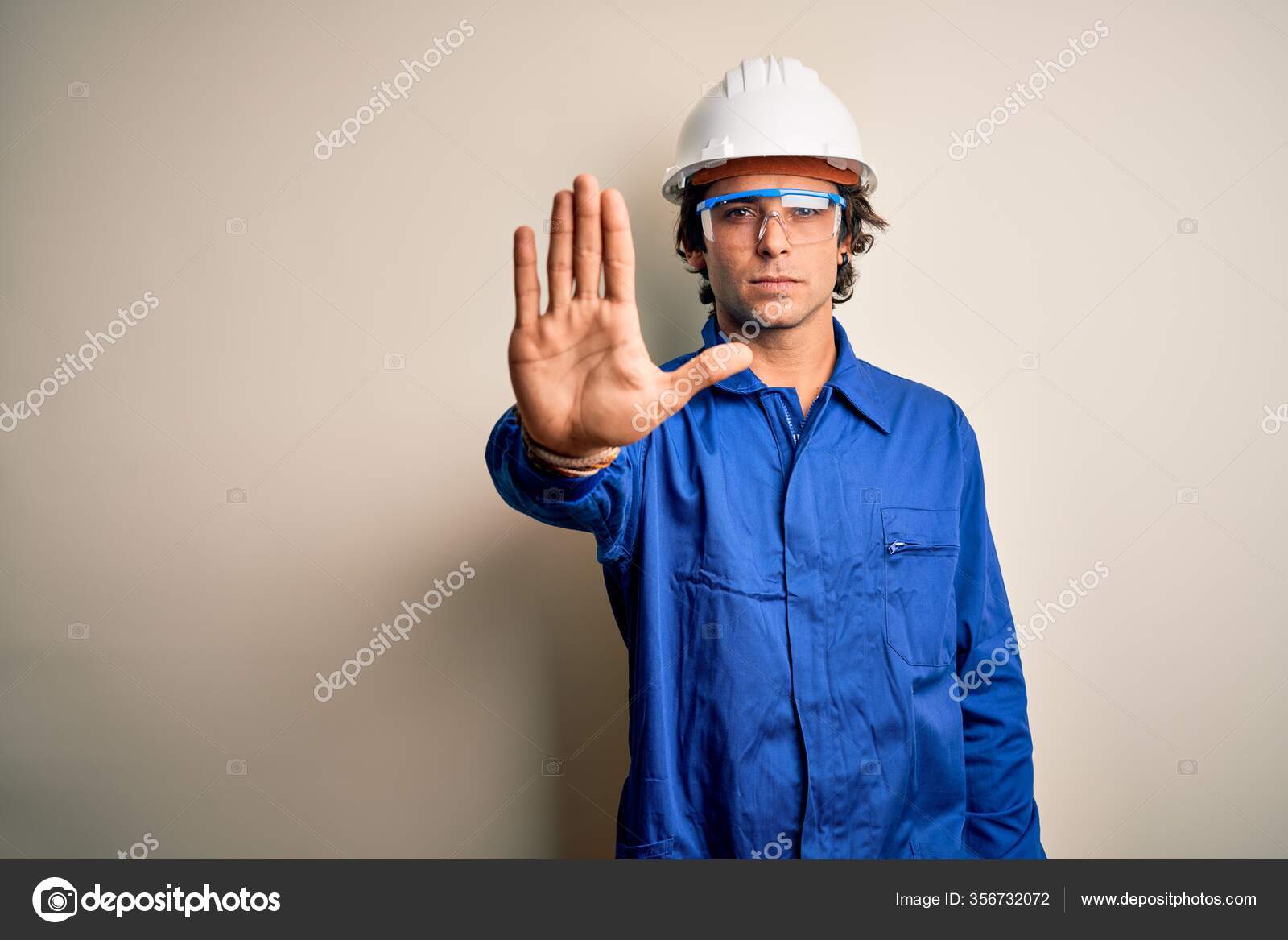 Young Constructor Man Wearing Uniform Security Helmet Isolated White ...