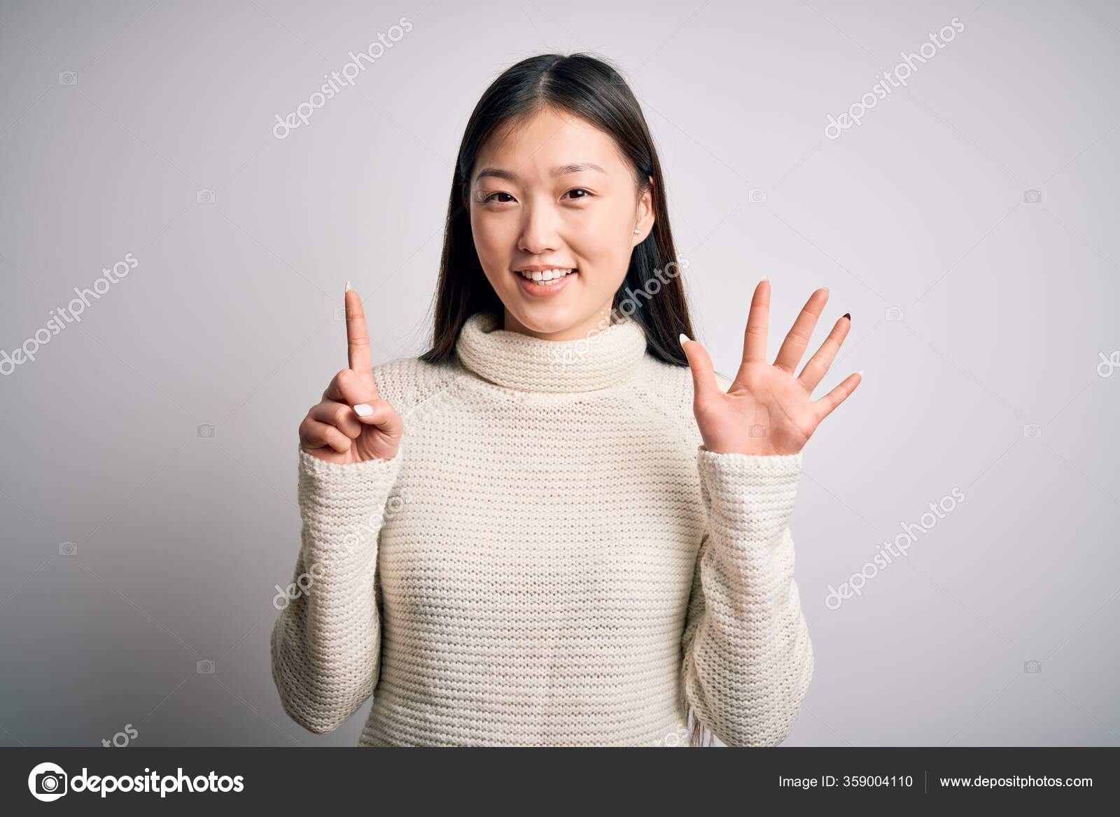 Young Beautiful Asian Woman Wearing Casual Sweater Standing Isolated ...