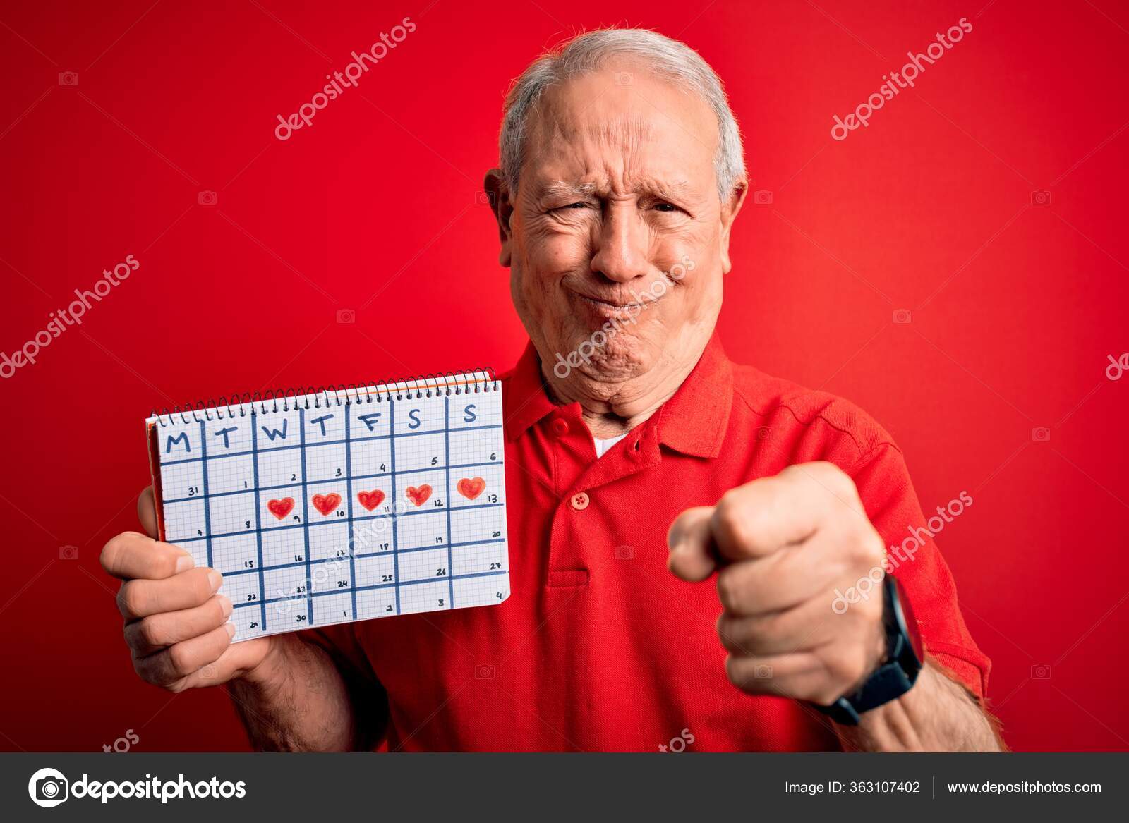 Senior Grey Haired Man Holding Special Date Calendar Red Background ...