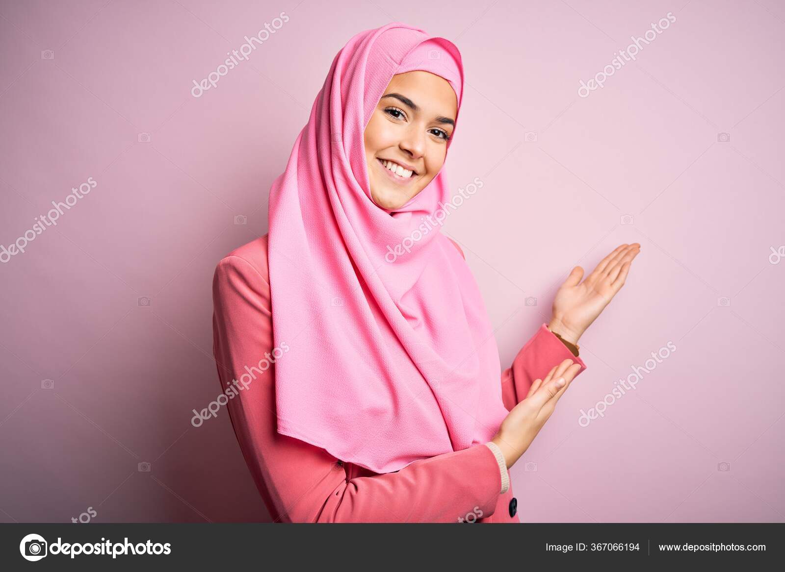 Young Beautiful Girl Wearing Muslim Hijab Standing Isolated Pink