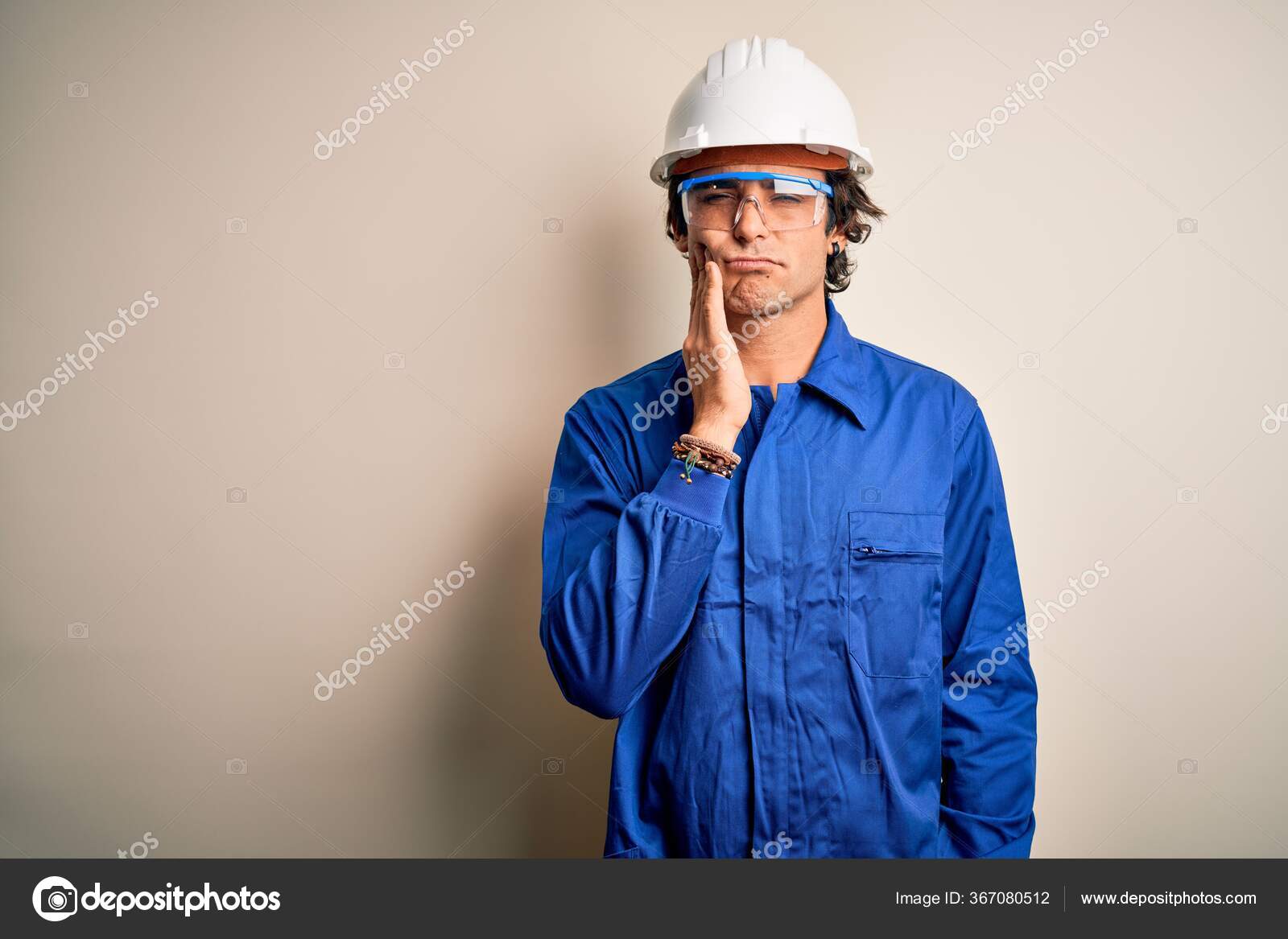 Young Constructor Man Wearing Uniform Security Helmet Isolated White ...