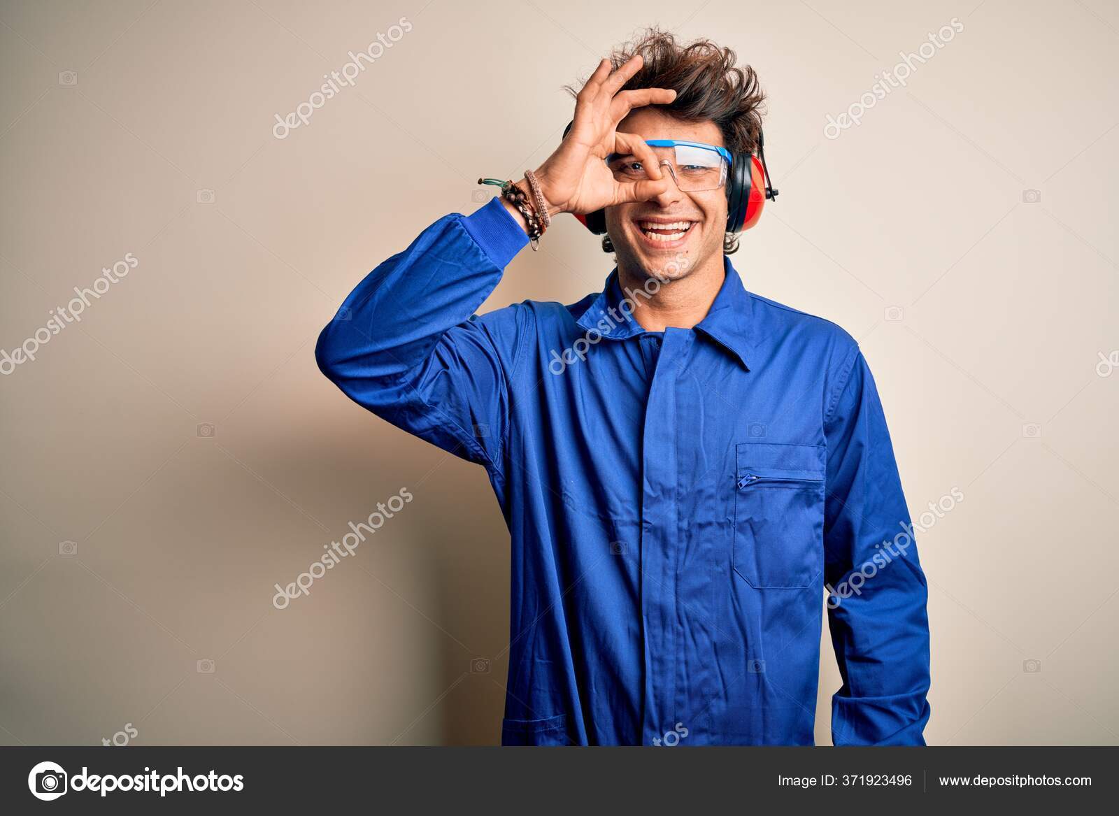 Young Constructor Man Wearing Uniform Earmuffs Isolated White ...