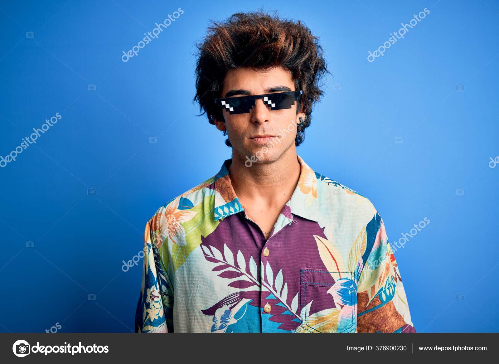 Young Handsome Man Wearing Thug Life Glasses Standing Isolated Blue ...