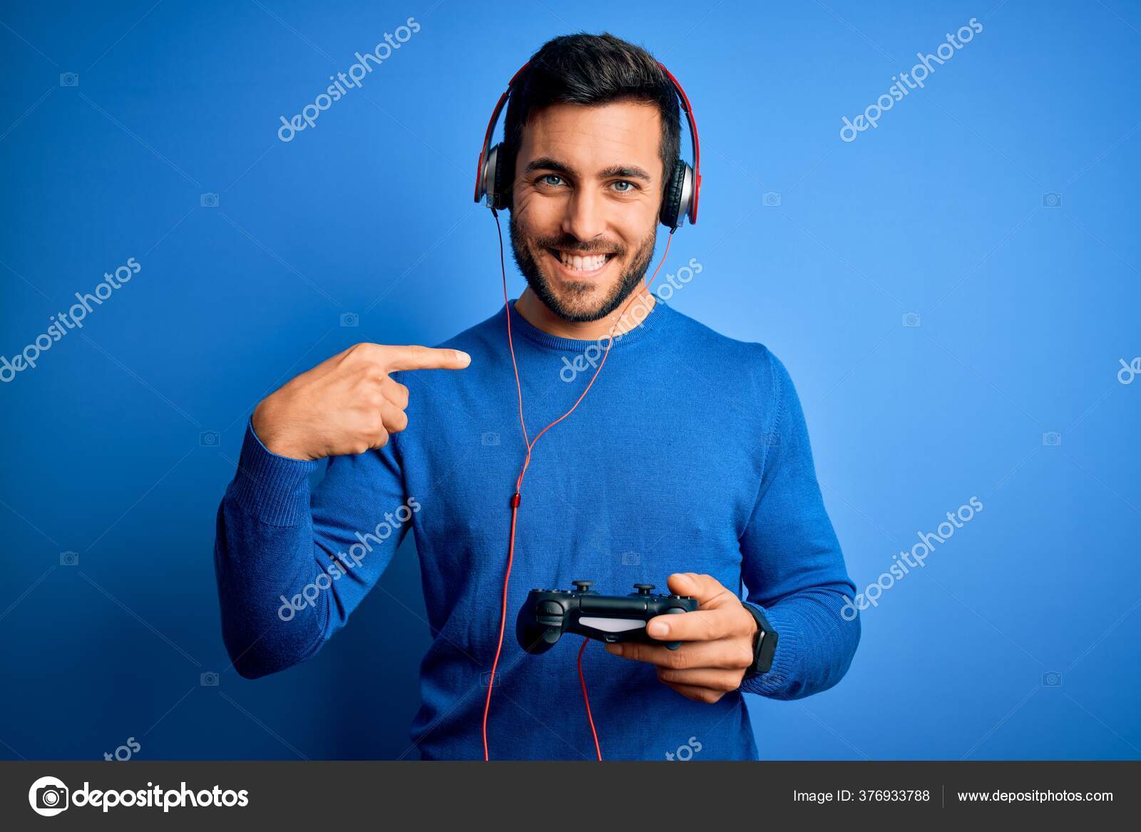 Young Handsome Gamer Man Beard Playing Video Game Using Joystick ...