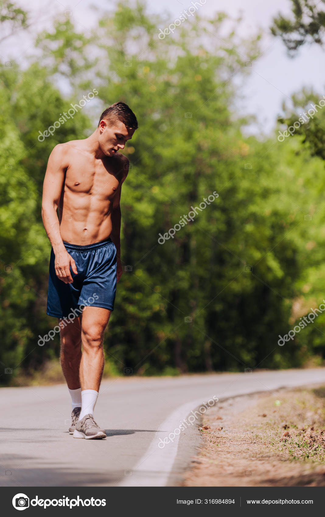 Man Jogging In Park