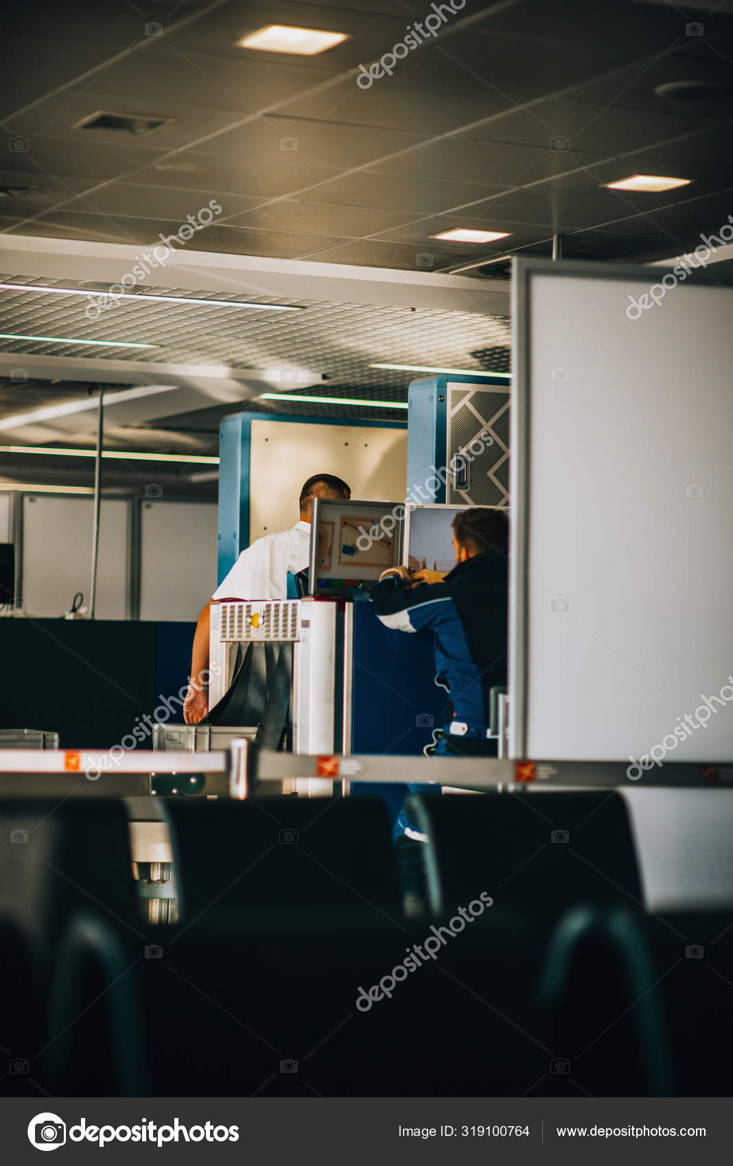 Airport security checking passenger items — Stock Photo © gorgev #319100764