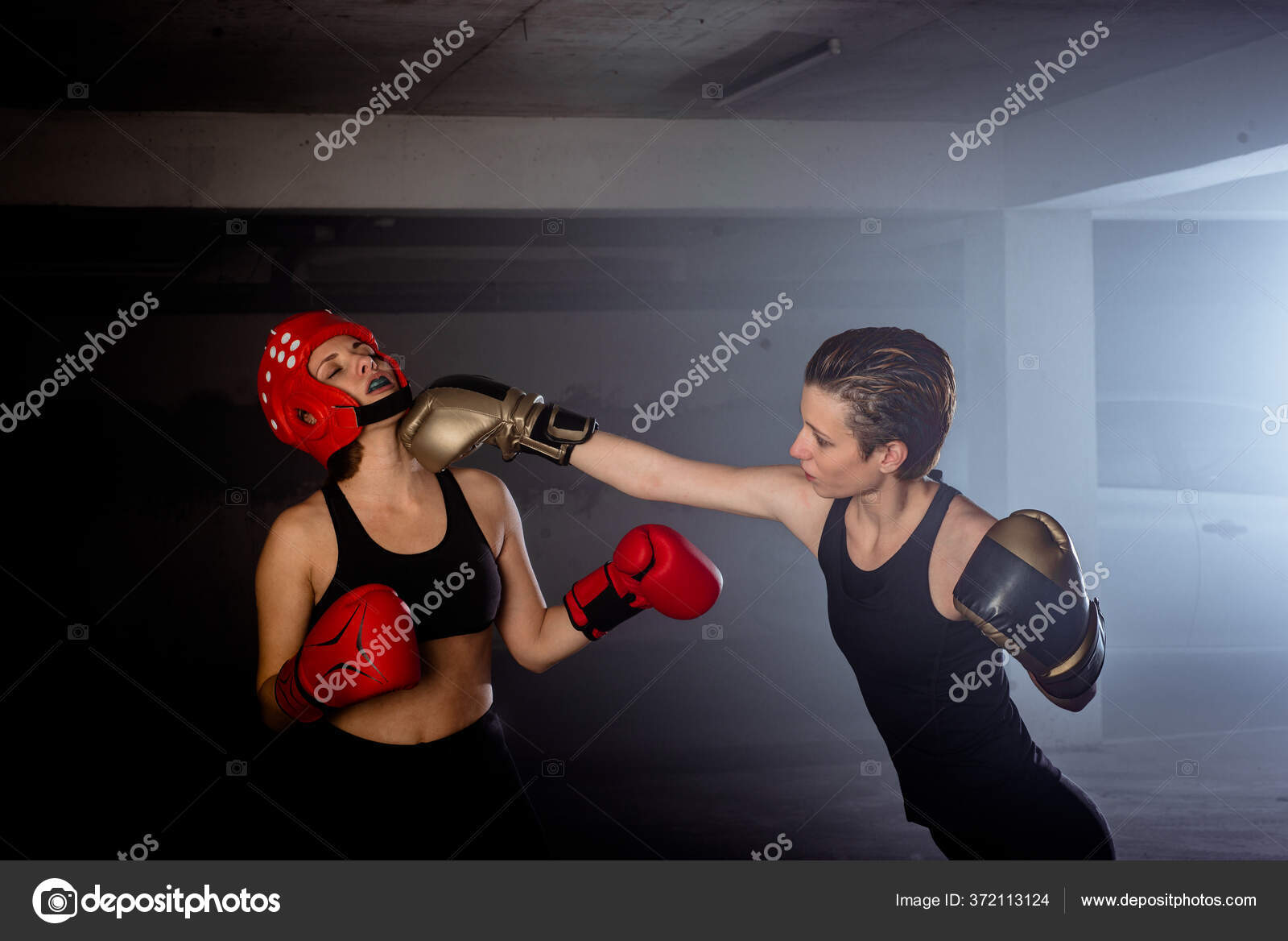Two Professional Female Boxers Punching Each Other Aggressive Garage ...