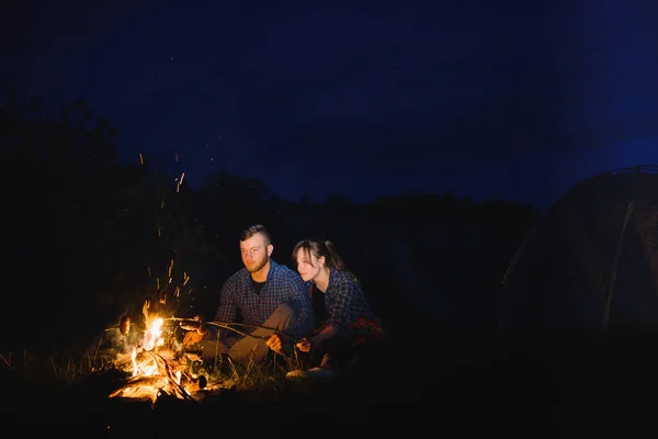 Campfire couple Stock Photos, Royalty Free Campfire couple Images ...