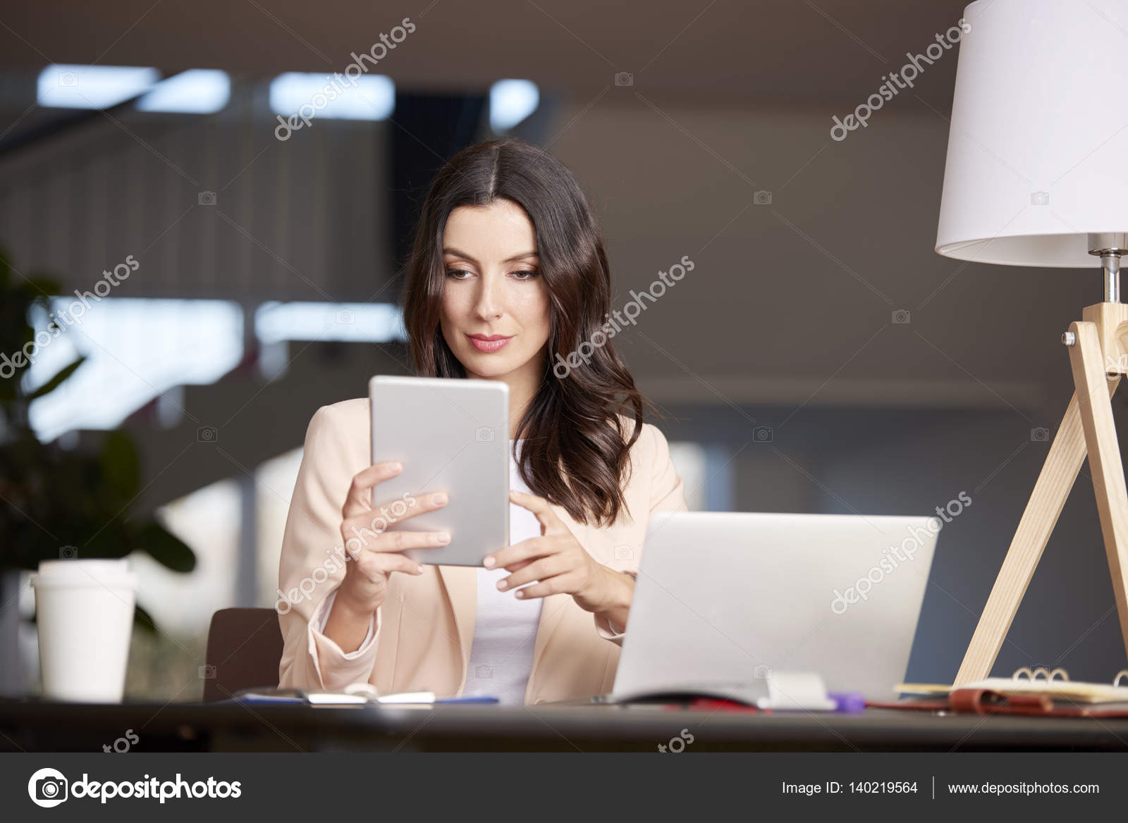 Woman Exploring modern technology — Stock Photo © gzorgz #140219564 Woman Exploring modern technology — Stock Photo © gzorgz #140219564