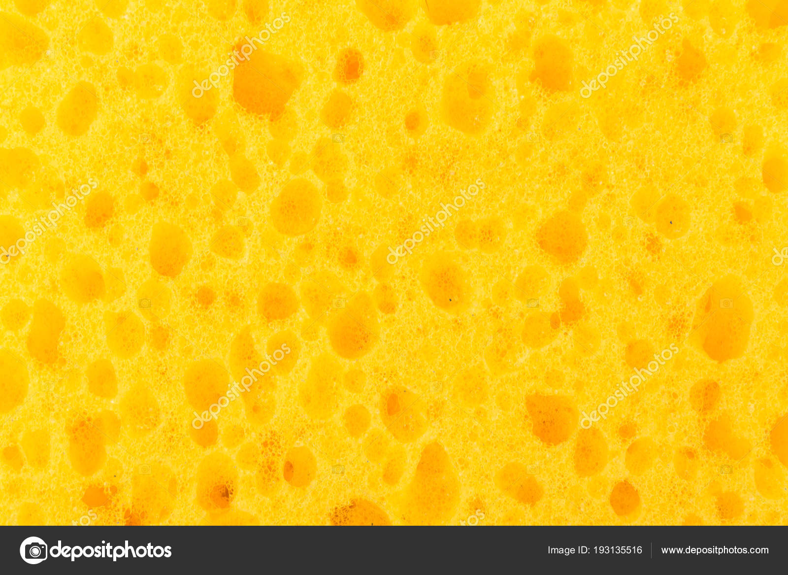 Texture yellow foam rubber, synthetic sponge with large pores, close-up ...