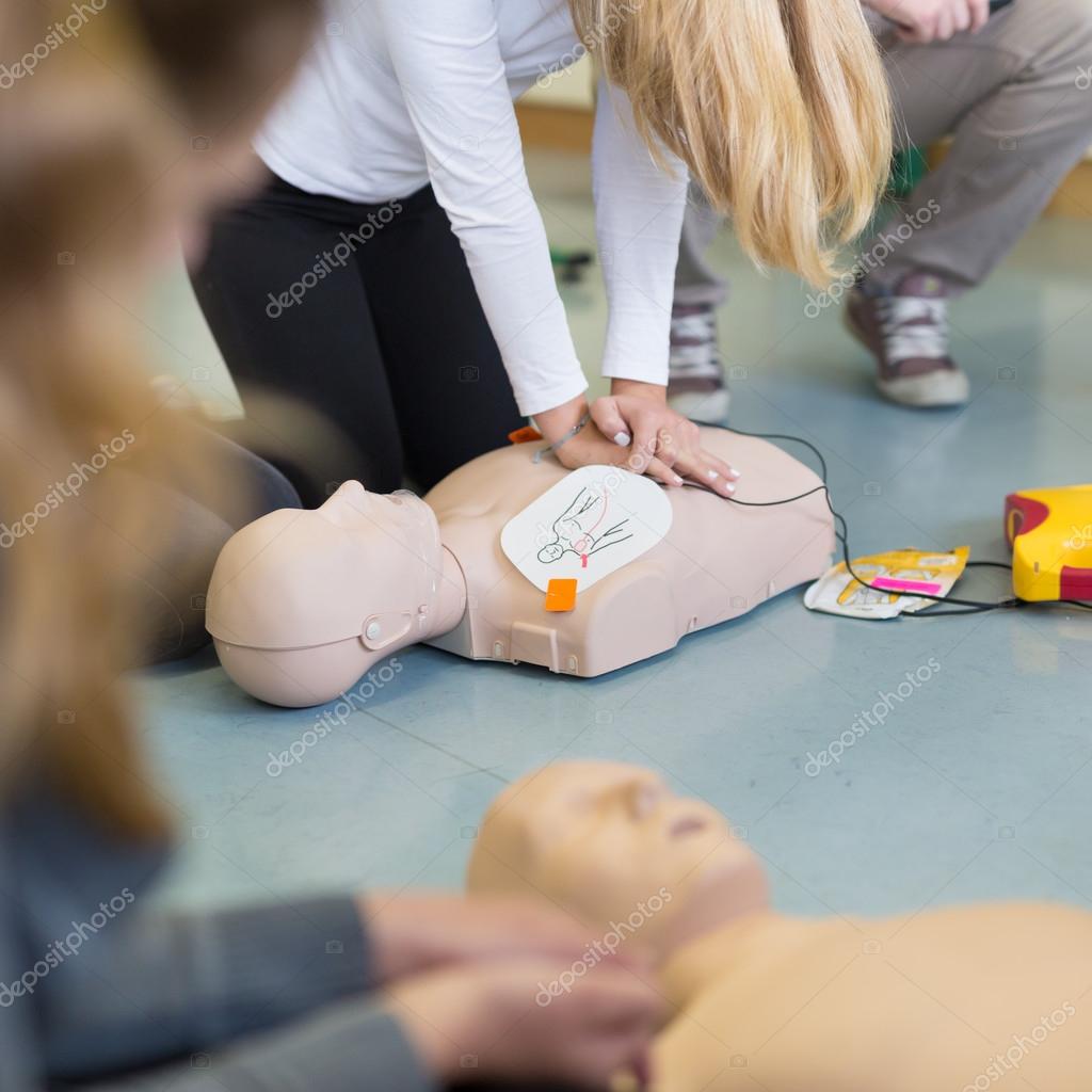 First aid resuscitation course using AED. — Stock Photo © kasto #127314500