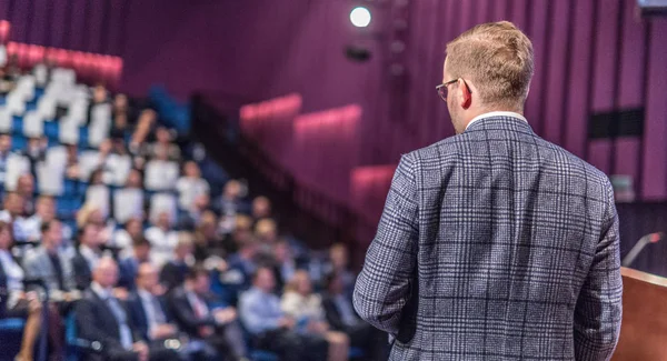 Public speaker giving talk at Business Event. - Stock Image - Everypixel
